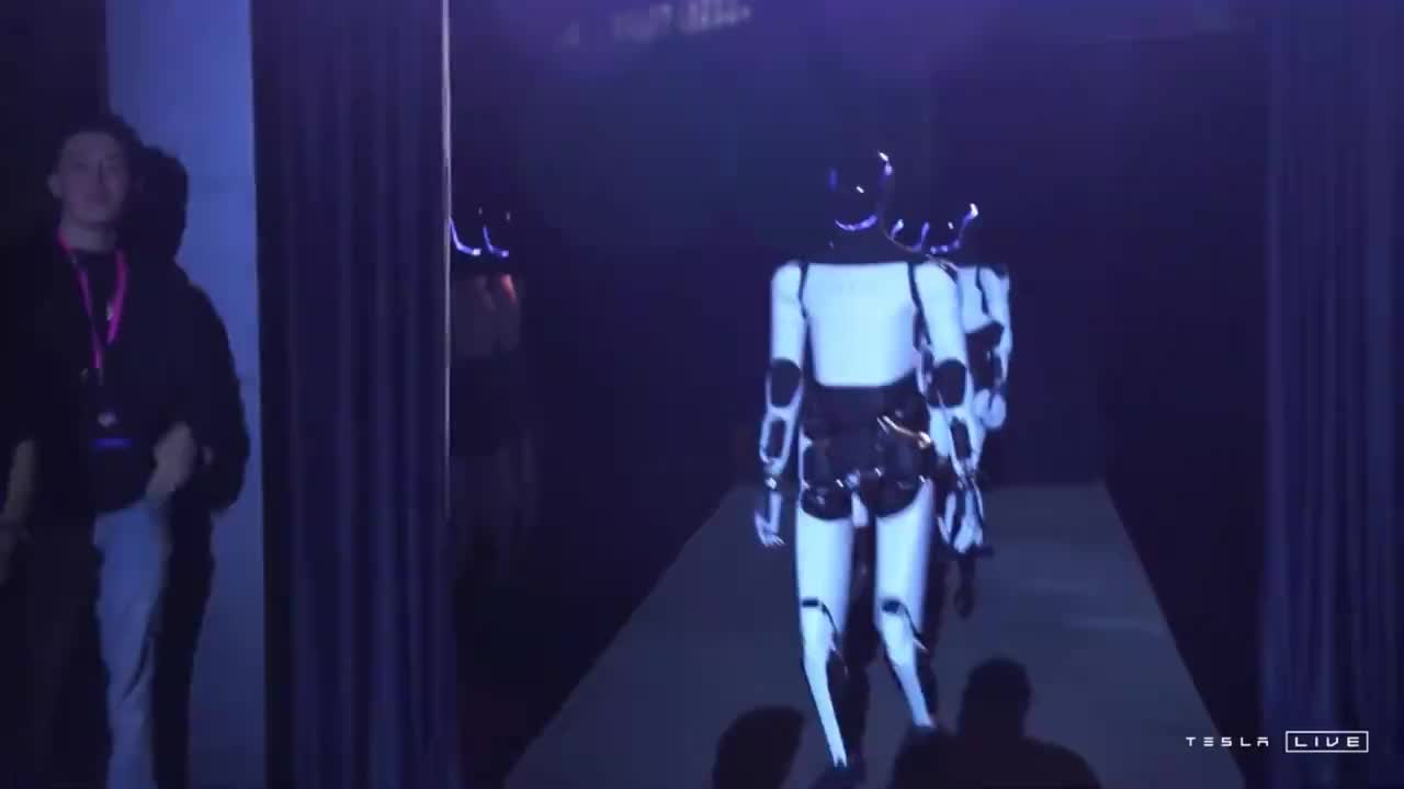 Shared post - Tesla unveils Optimus robot: Elon Musk claims 'biggest ...